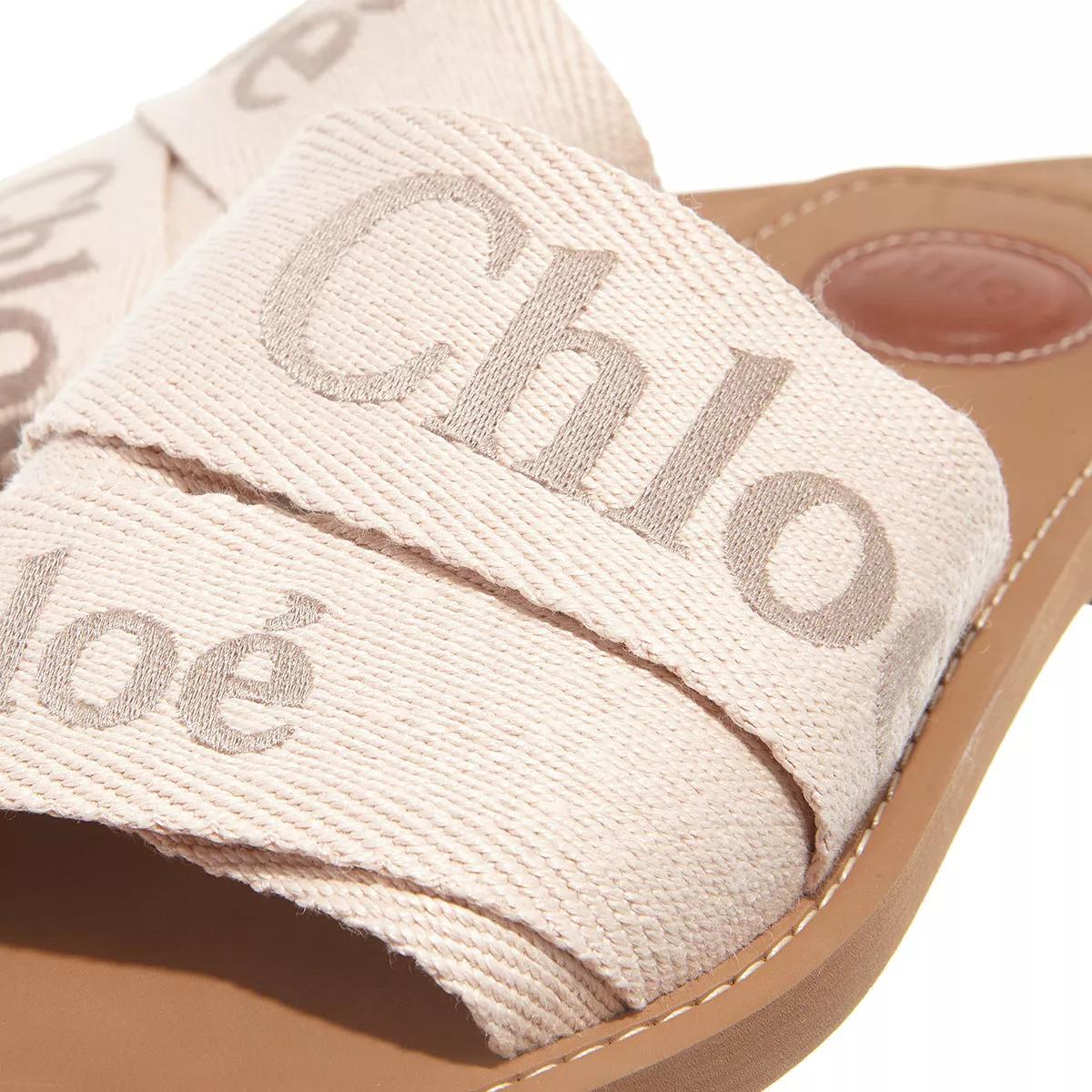 Chloé Slippers Woody Flat Slides in beige - Schoenen.nl